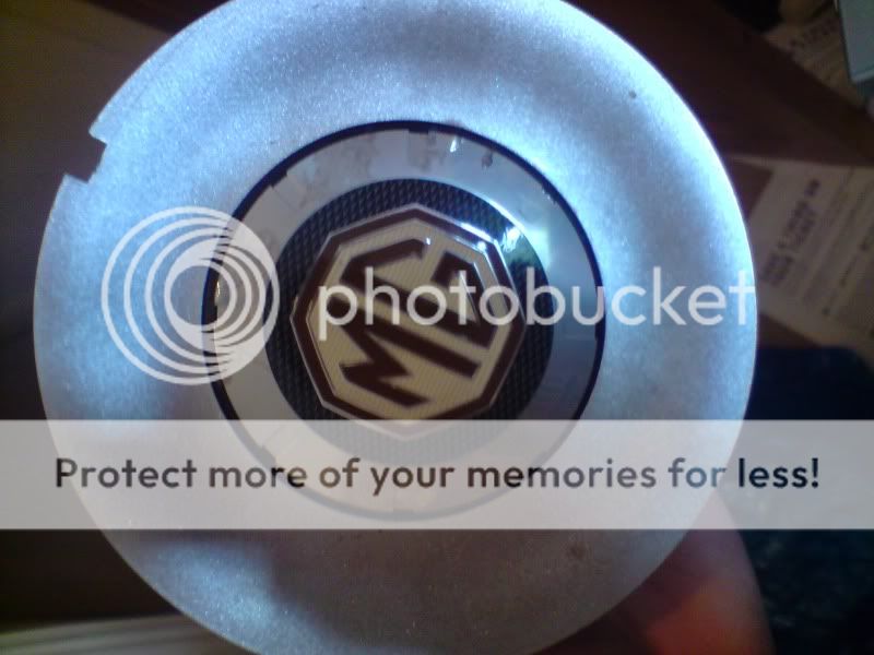 Removing centre of centre caps | MG-Rover.org Forums